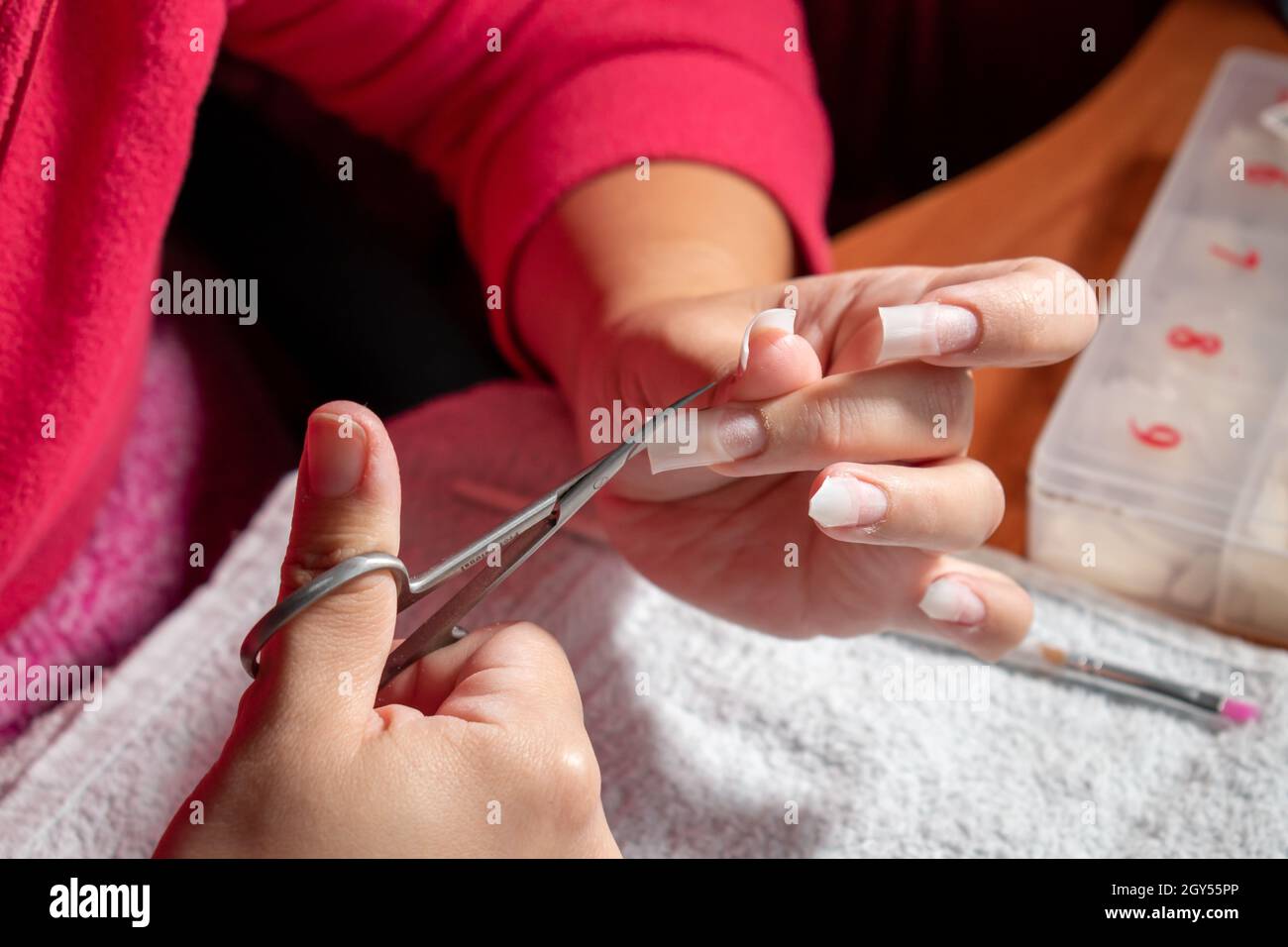Process of cutting the fingernails in the nail salon Stock Photo - Alamy