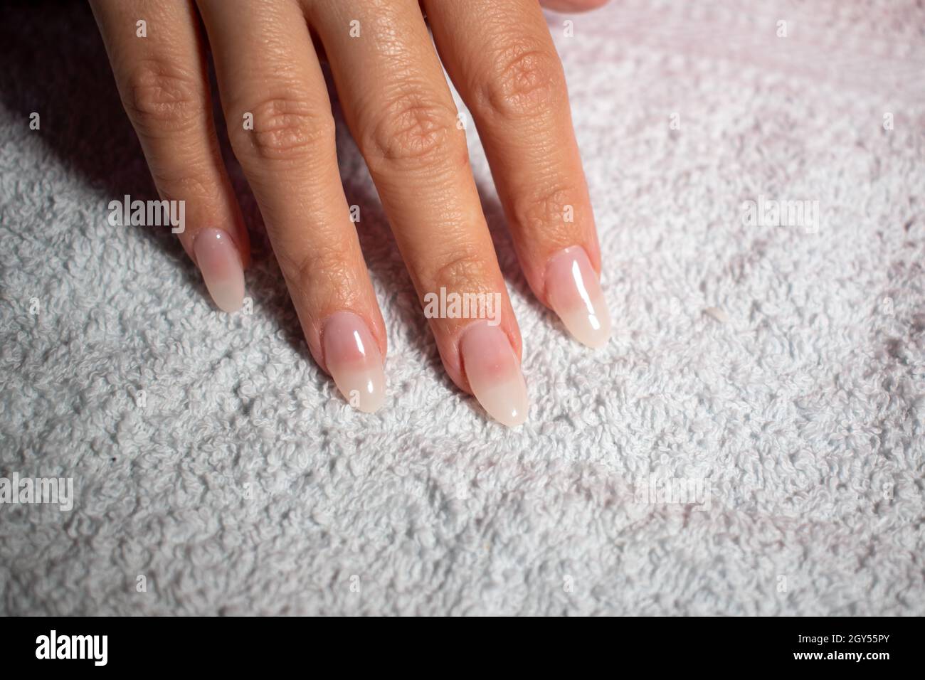 Female hand with elegant and natural design manicure Stock Photo - Alamy