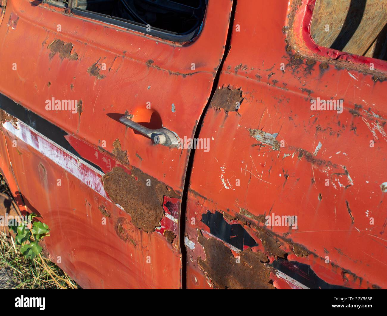 Old abandoned car. Detail of old rusty car part Stock Photo - Alamy