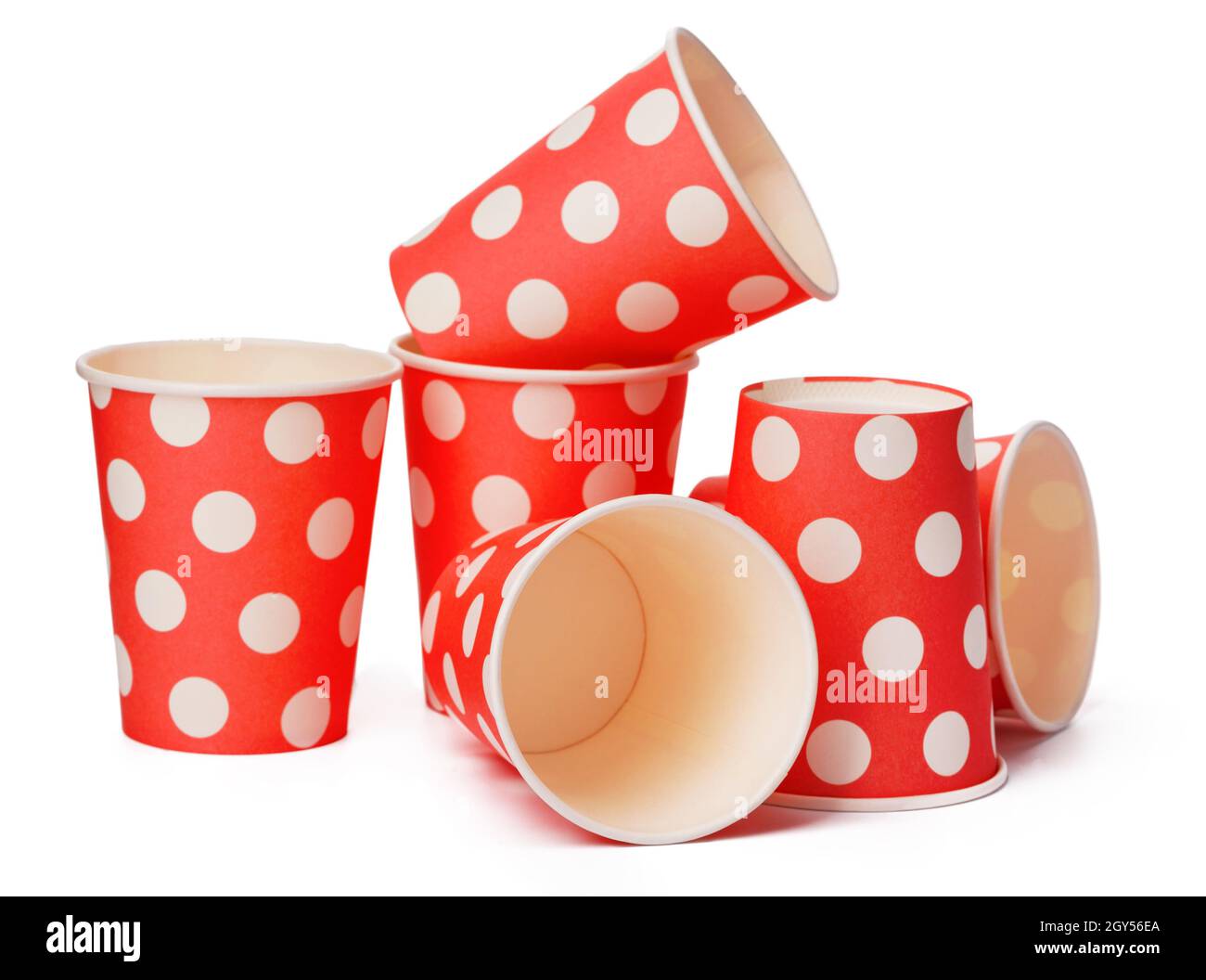 Group of cardboard disposable red dotted cups isolated Stock Photo - Alamy