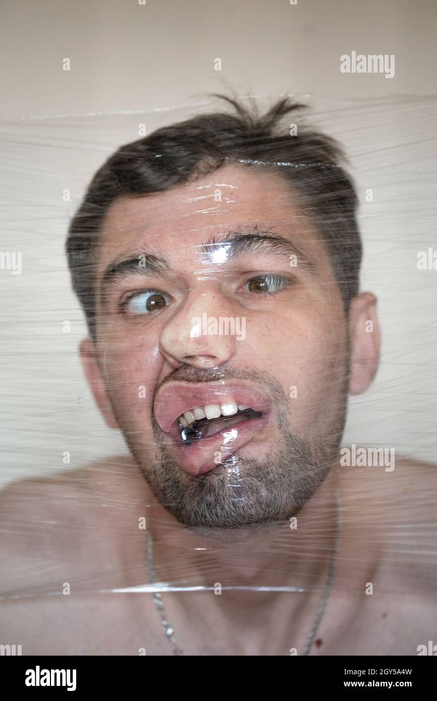 Plastic wrap face hi-res stock photography and images - Alamy