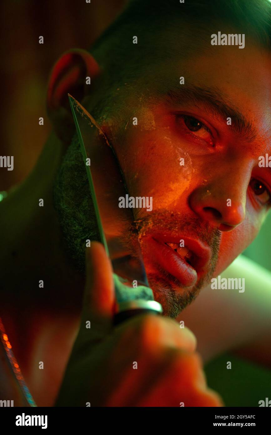 guy shaves with a knife close up Stock Photo - Alamy