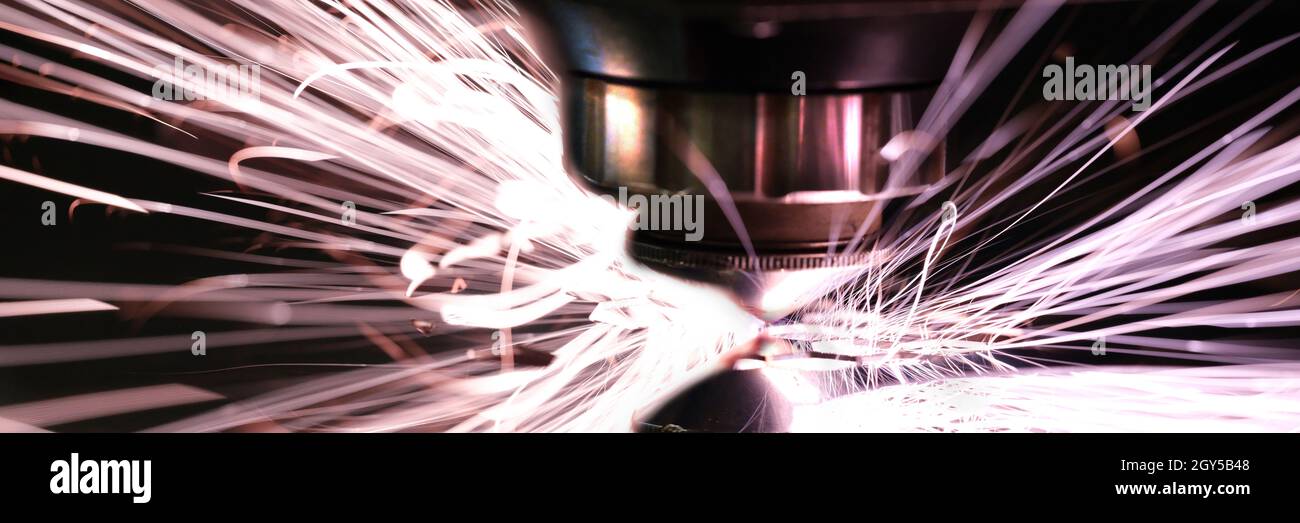 Laser cut machine industrial metal processing process closeup ...