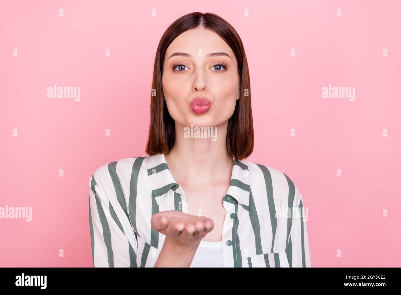 Photo Of Sweet Flirty Brunette Lady Blow Kiss Wear White Shirt Isolated