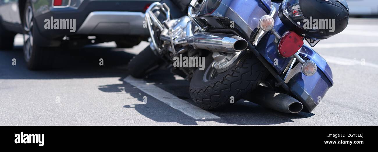Motorcycle crashed into back of vehicle in front of it Stock Photo - Alamy