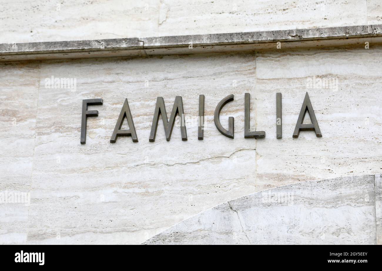 big text FAMIGLIA that means family in Italian language Stock Photo - Alamy