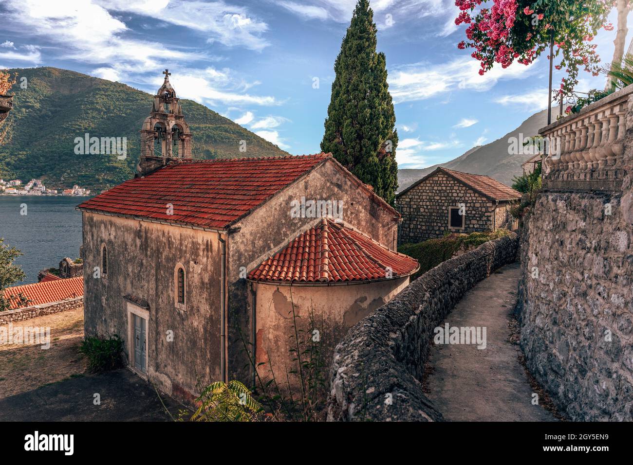 Beautiful old buildings and churches in Perast, Montenegro Stock Photo ...