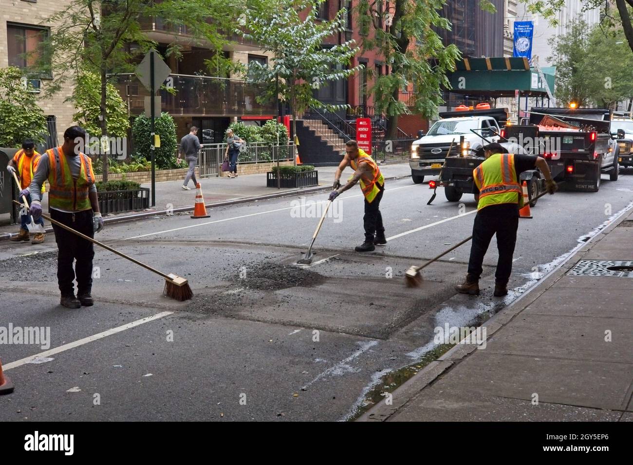 New York, NY, USA - Oct 6, 2021: Workers prepare roadbed for a new ...