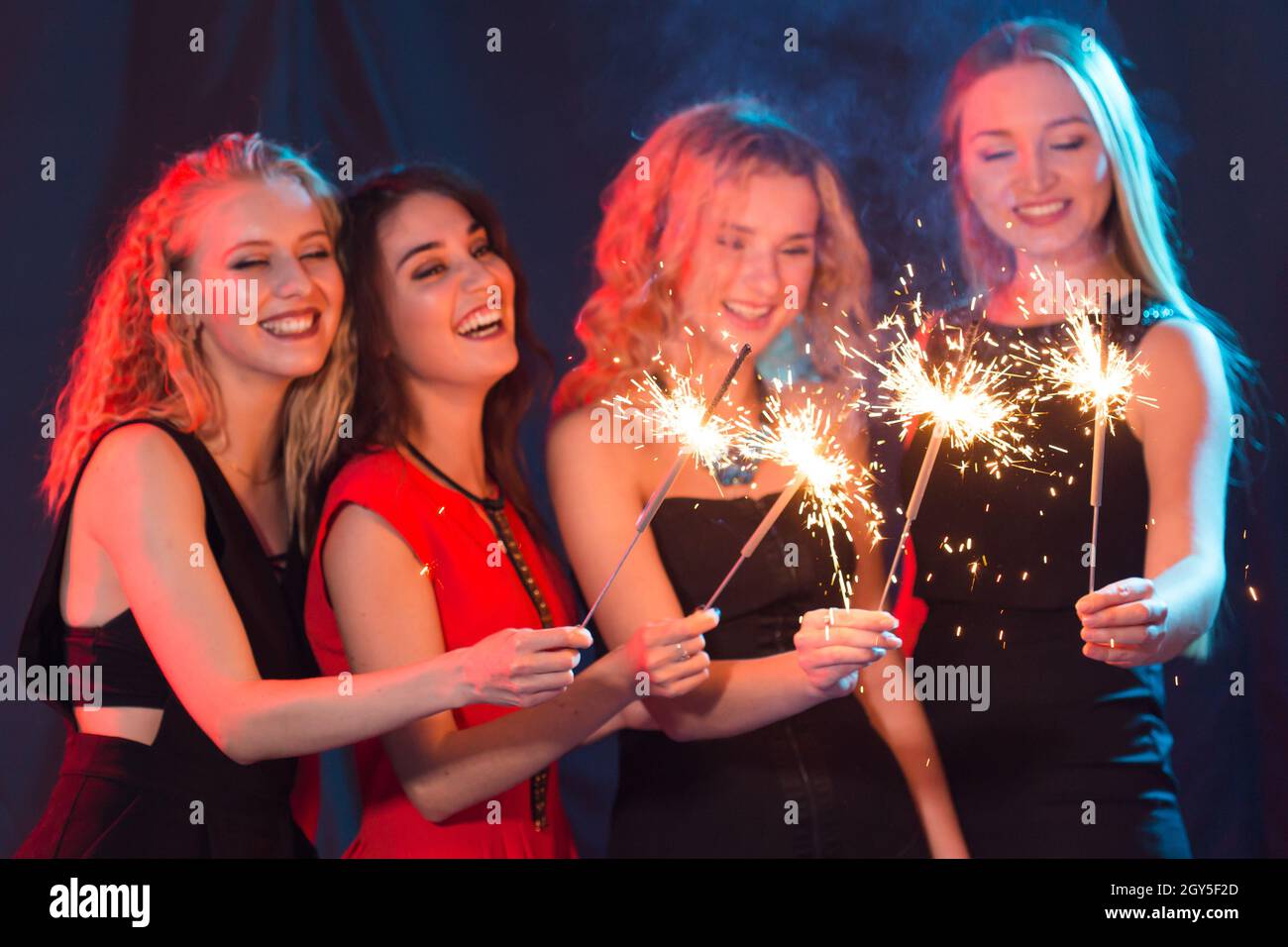 Birthday party, new year and holidays concept - Group of female friends ...