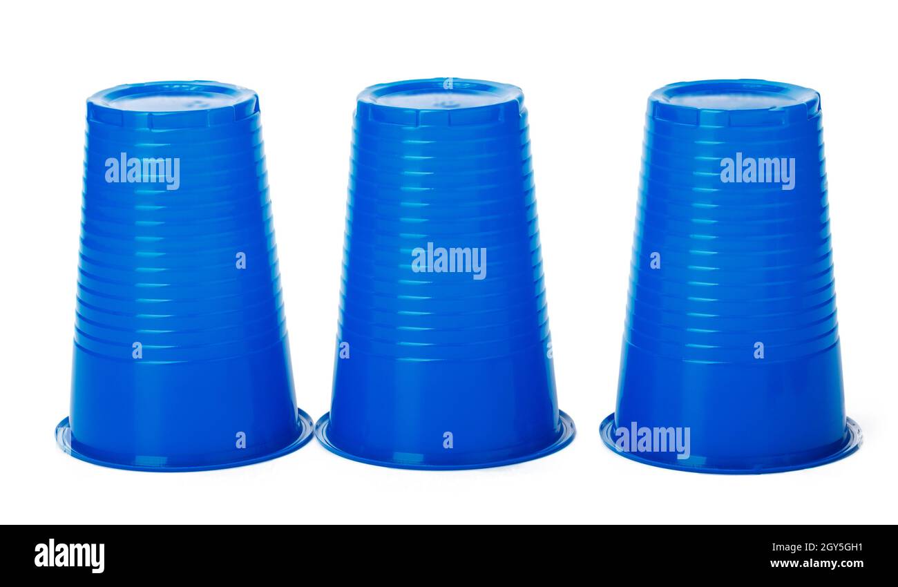 Pile of plastic cups on white background Stock Photo - Alamy