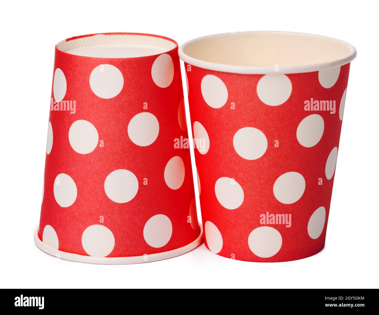 Group of cardboard disposable red dotted cups isolated Stock Photo - Alamy