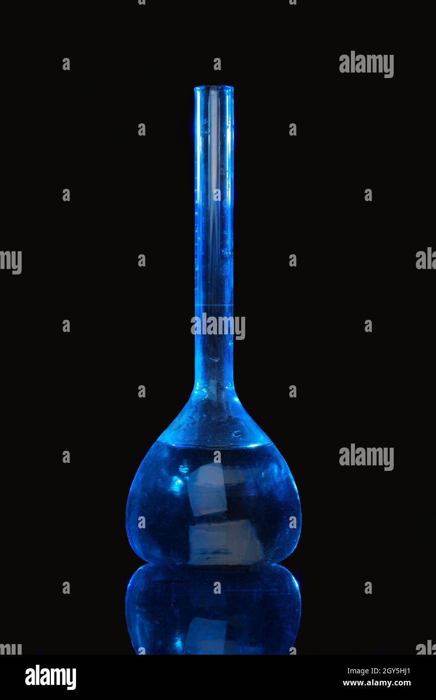 Laboratory flask glassware with reflections on table close up Stock ...