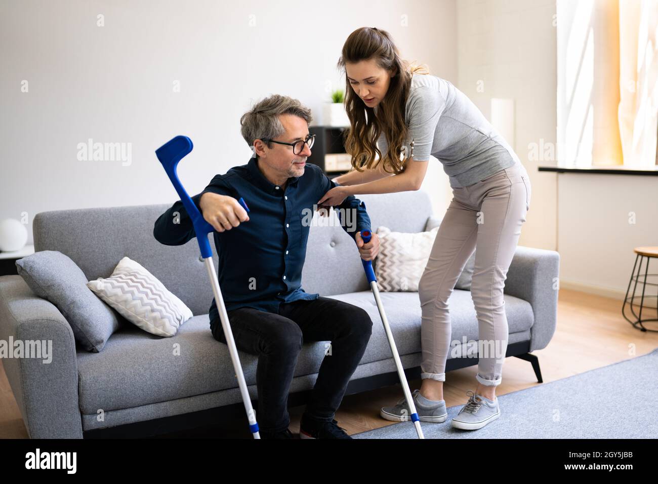 Helping the handicapped hi-res stock photography and images - Alamy