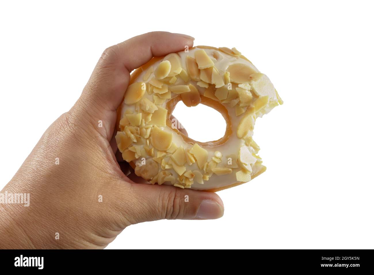 The hand is caught a doughnut isolated on a white background Stock ...