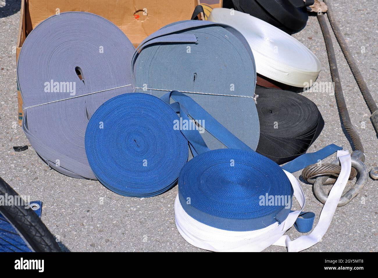 Synthetic nylon webbing straps sold on outdoors market Stock Photo - Alamy