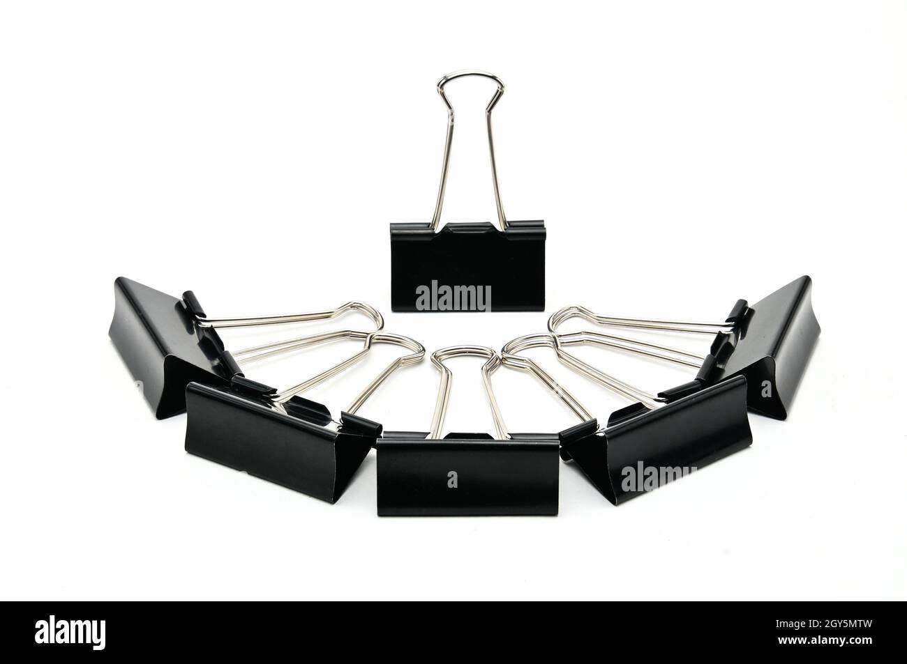 Binder clip device for tying paper sheets together Stock Photo - Alamy