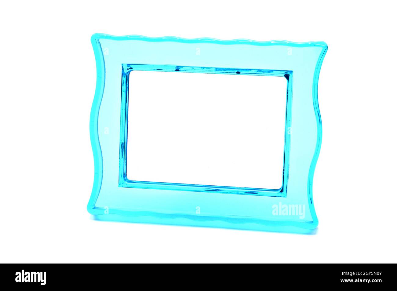 Vintage transparent plastic turquoise color photo frame on an isolated ...