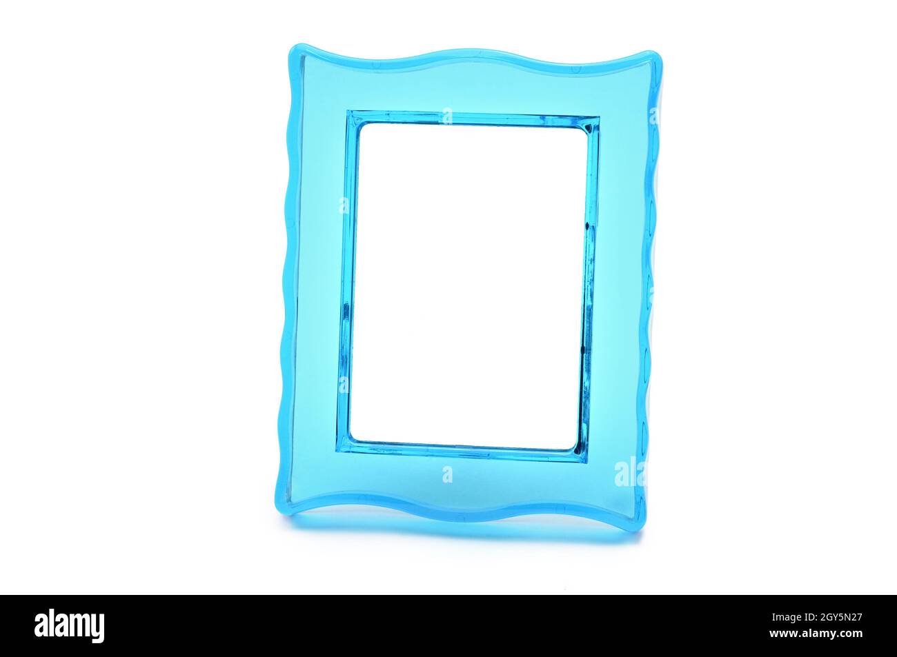 Vintage transparent plastic turquoise color photo frame on an isolated ...