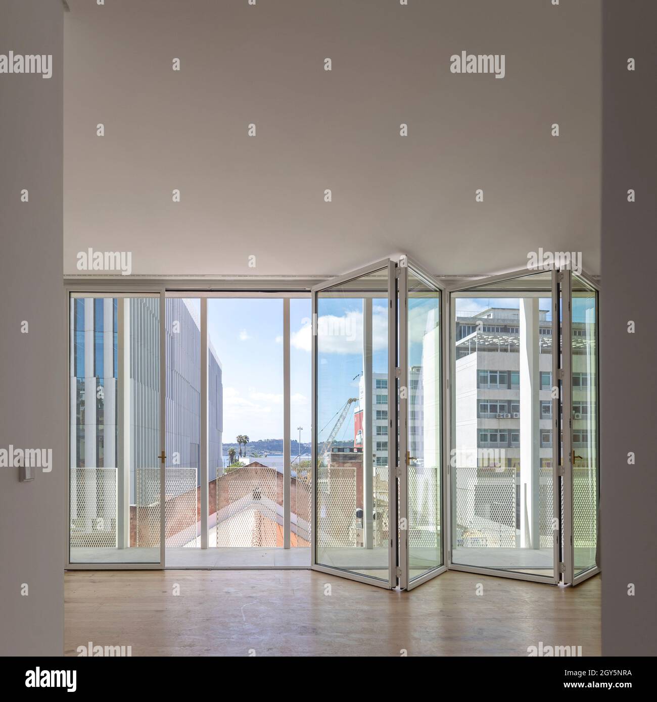 Interior view with concertina windows. Ribeira 11, Lisbon, Portugal ...