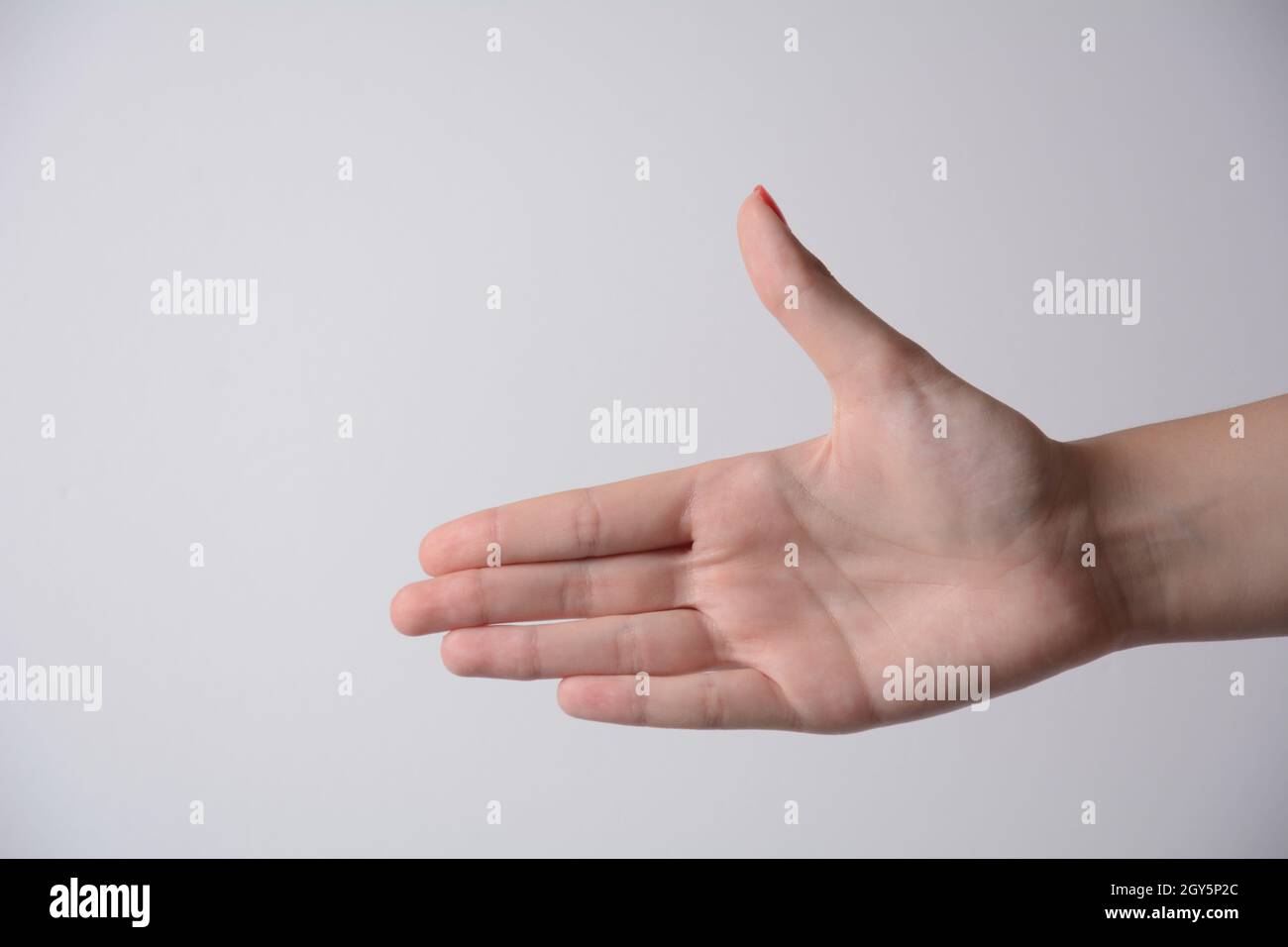 Right palm hand of a young girl keeps. Isolated on white background ...