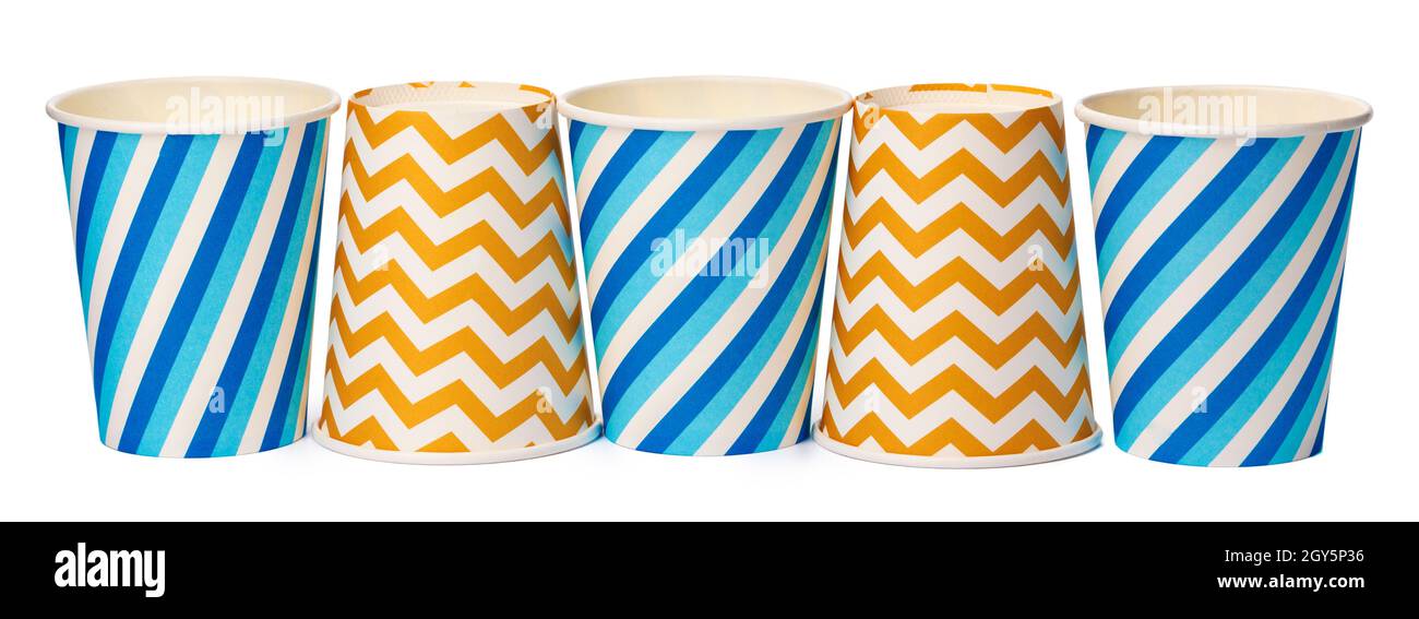 Paper disposable cups with colored pattern isolated on white background ...