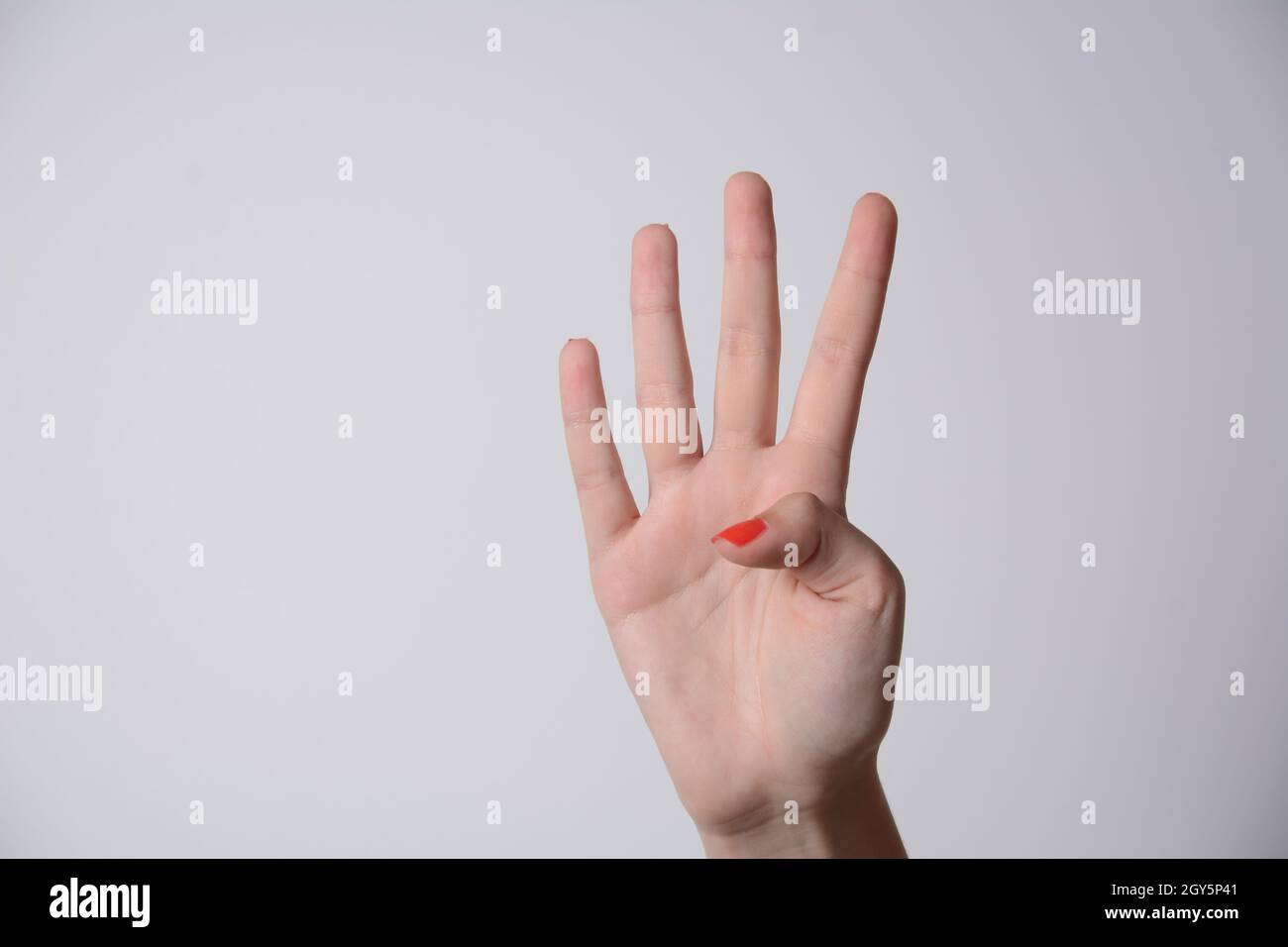 Number four Woman Hand, A hand sign gesture Stock Photo - Alamy