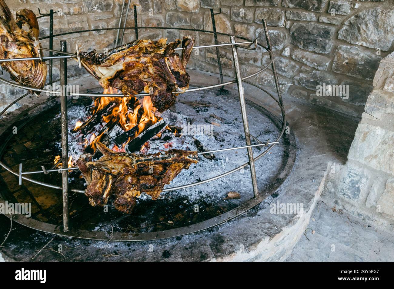 View of traditional Greek barbecue called Antikristo Stock Photo - Alamy