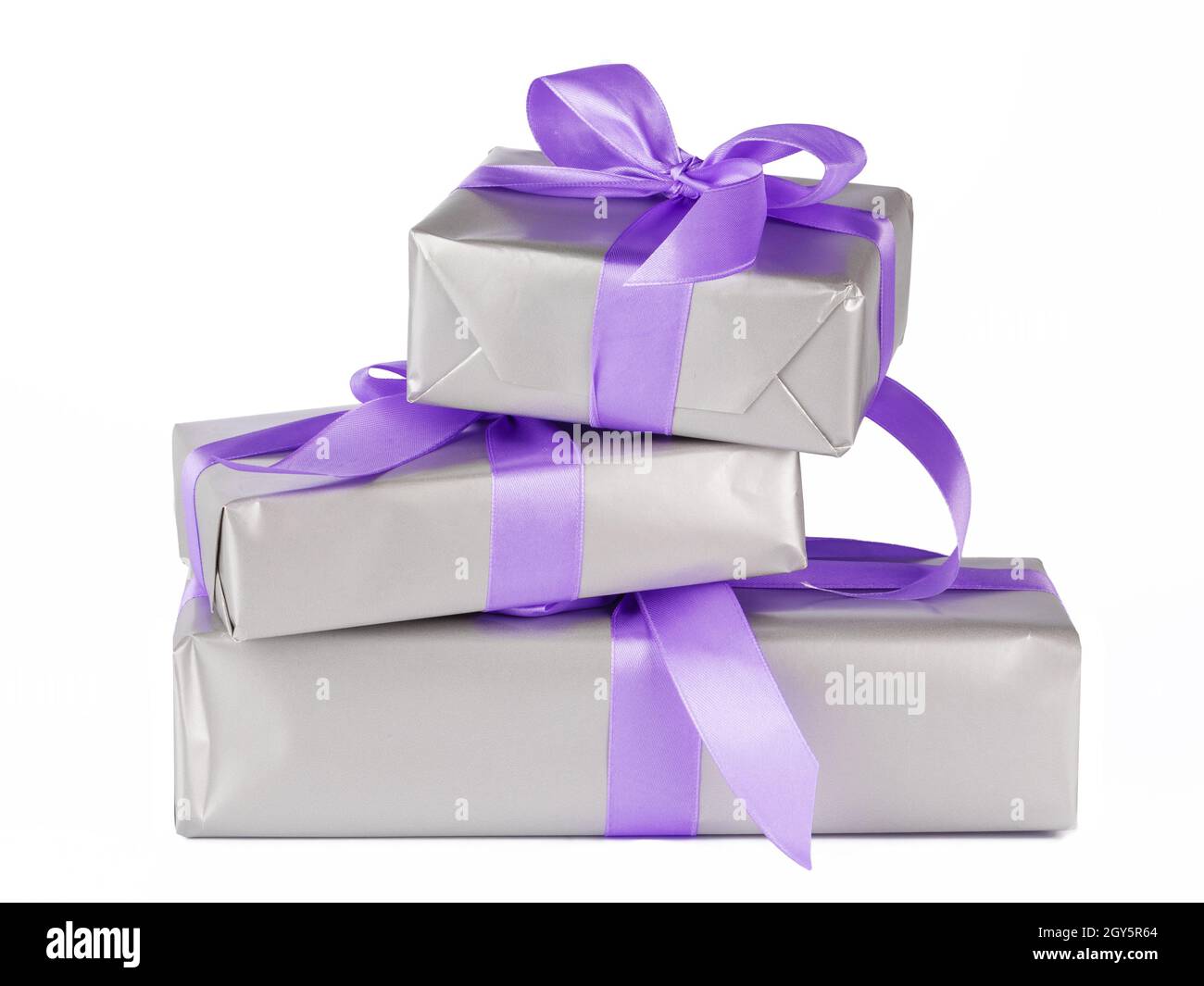 Colorful stacked gift boxes isolated on white background Stock Photo ...
