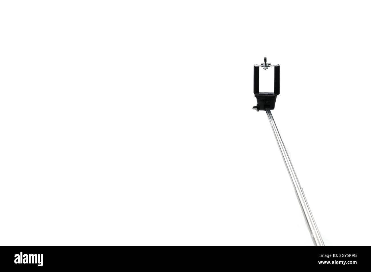 Extending monopod for selfie and smartphone for isolation from white ...