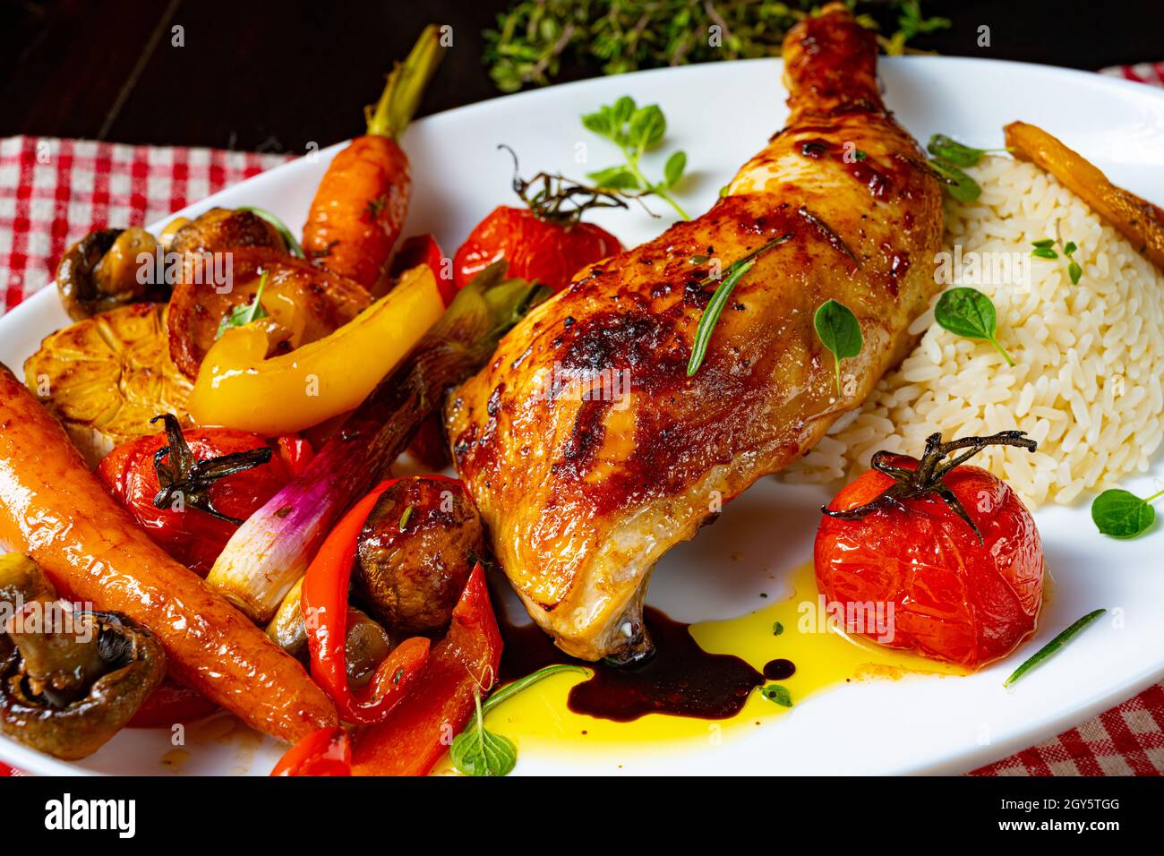 Rustic fried chicken legs with assorted vegetables and rice Stock Photo ...