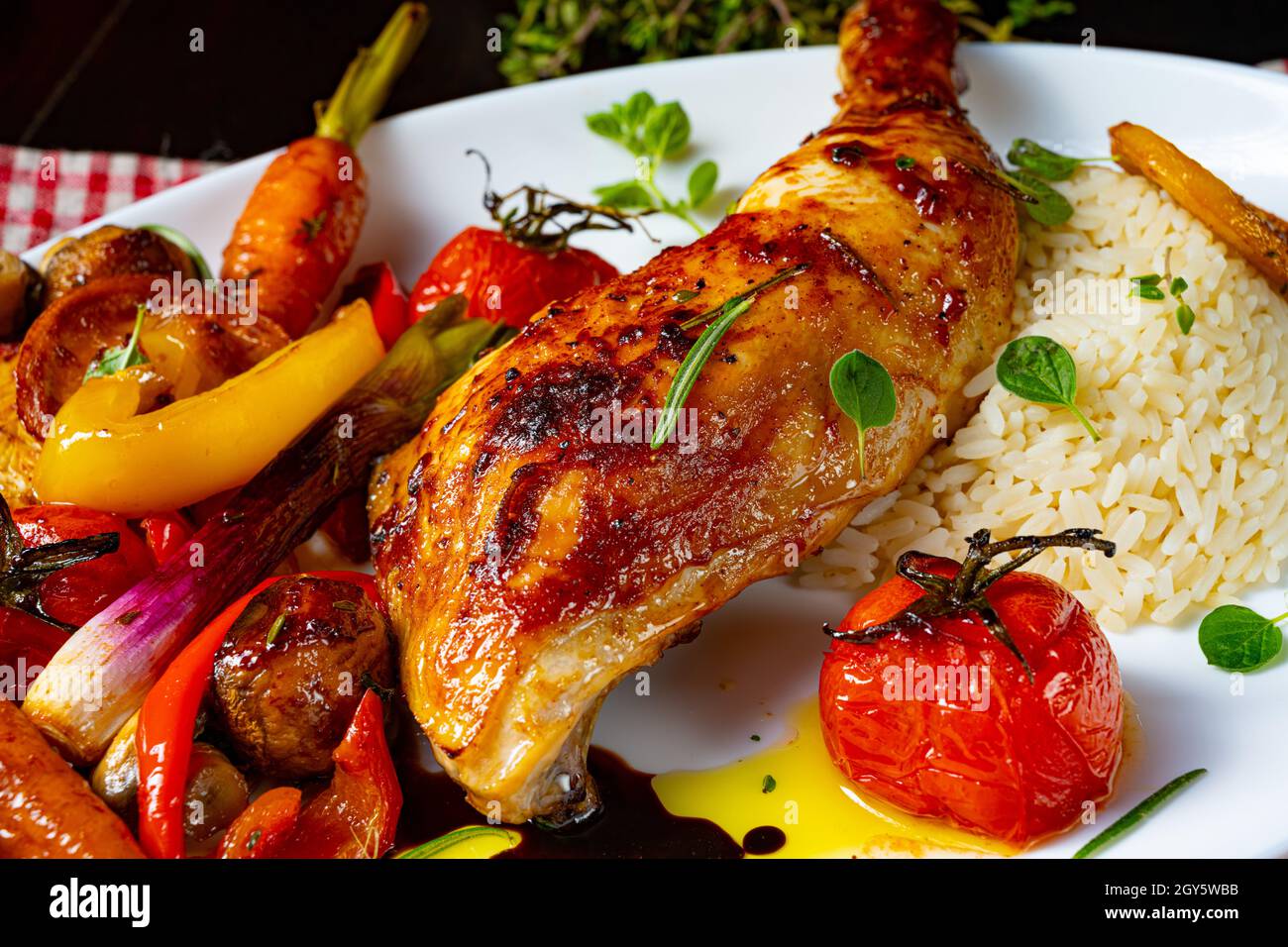 Rustic fried chicken legs with assorted vegetables and rice Stock Photo ...