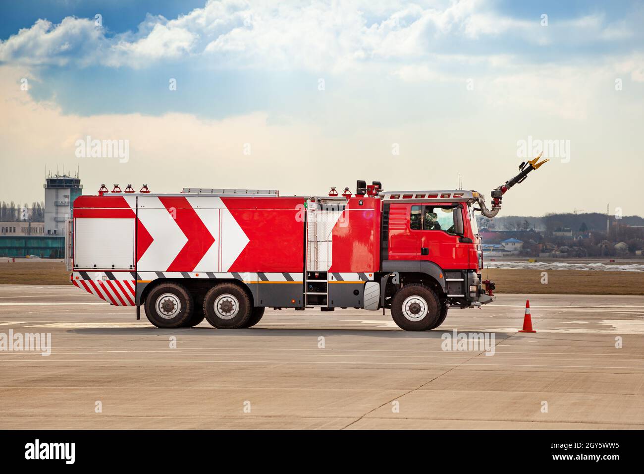 New red fire truck at the airport. Outdoor. Copy space. Transportation ...
