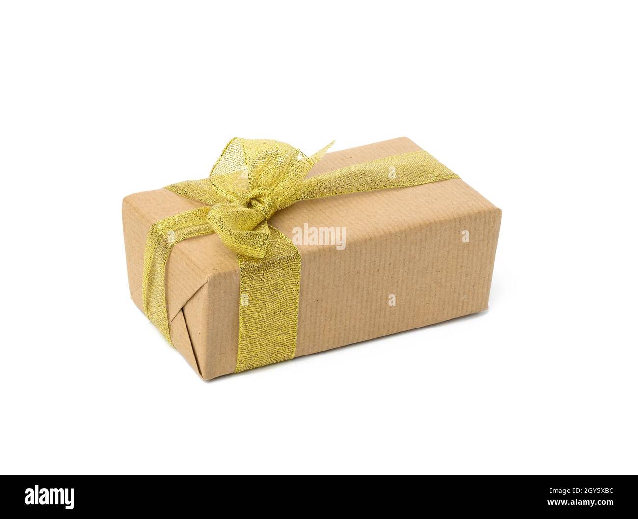 rectangular box wrapped in brown kraft paper and golden ribbon. Gift ...