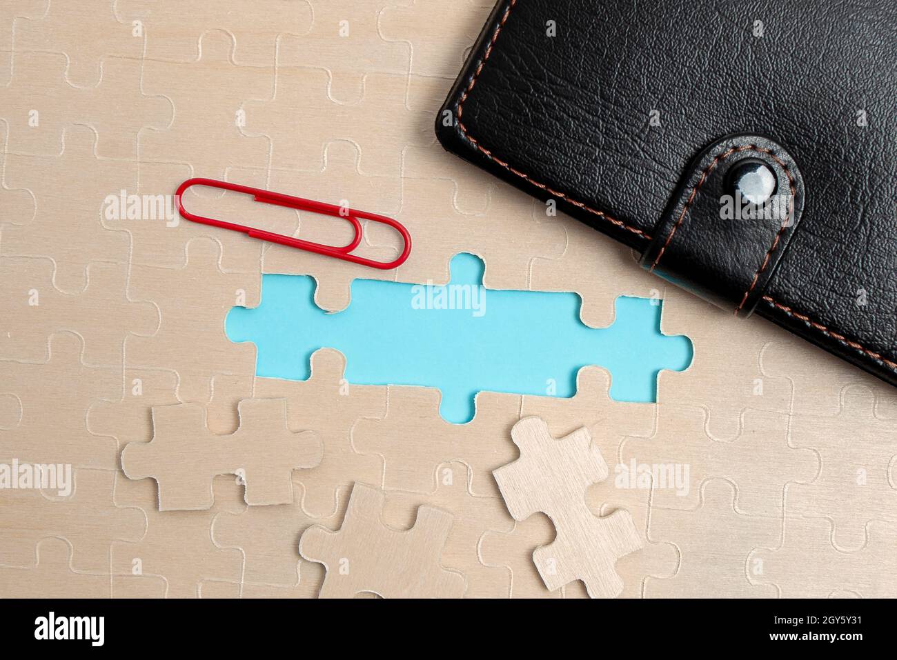 Building An Unfinished White Jigsaw Pattern Puzzle With Missing Last ...