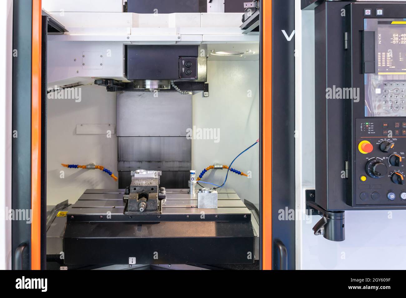 Closeup front view of numerically controlled machine tool Stock Photo ...