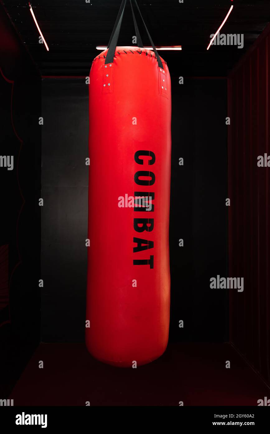 Boxing sandbag with dark background Stock Photo - Alamy