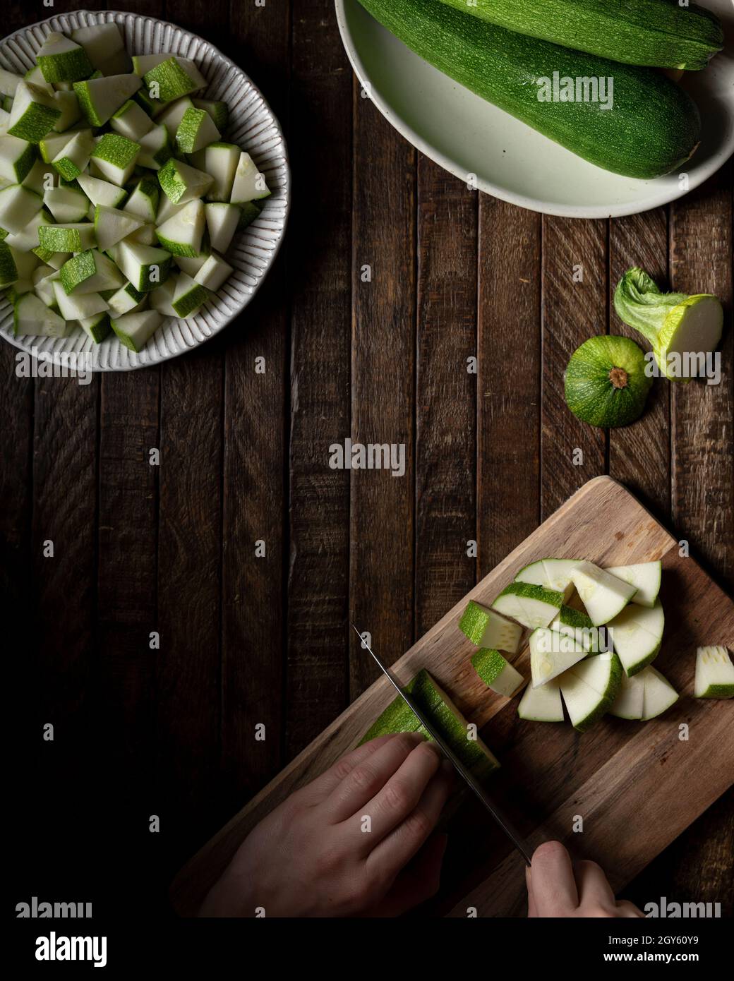 Cut zucchini on chopping board hi-res stock photography and images - Alamy