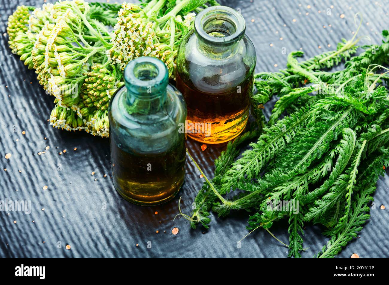 Jar of yarrow tincture.Medicine made from medicinal herbs.Herbalism and ...