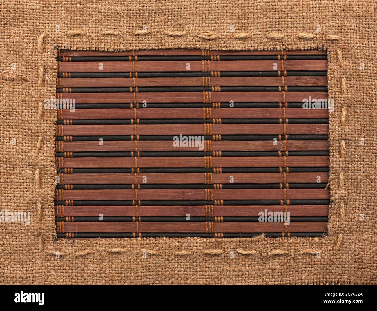 Frame of burlap, lies on a bamboo mat, with place for your text Stock ...