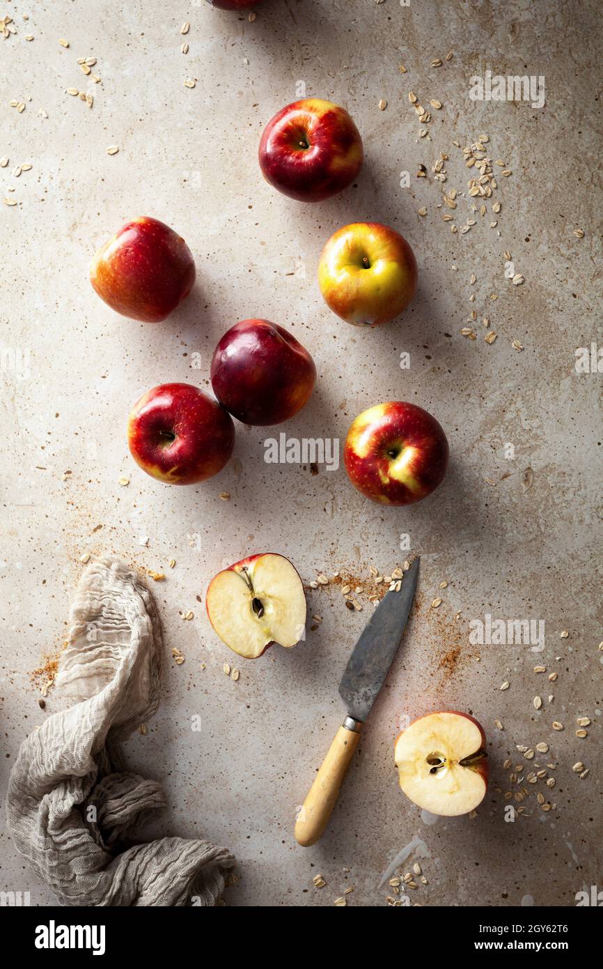 Red apples on a stone surface Stock Photo - Alamy