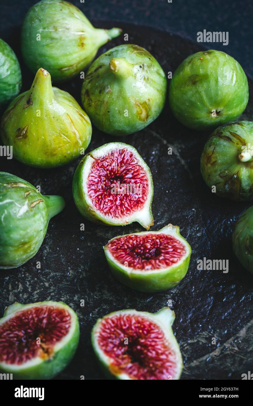 Fresh figs on a dark background Stock Photo - Alamy