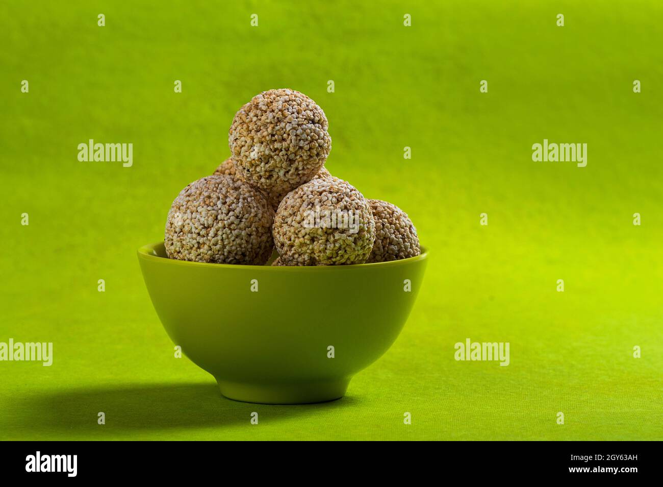Amaranth or Rajgira laddu, Cholai ke laddo in green Bowl on green ...