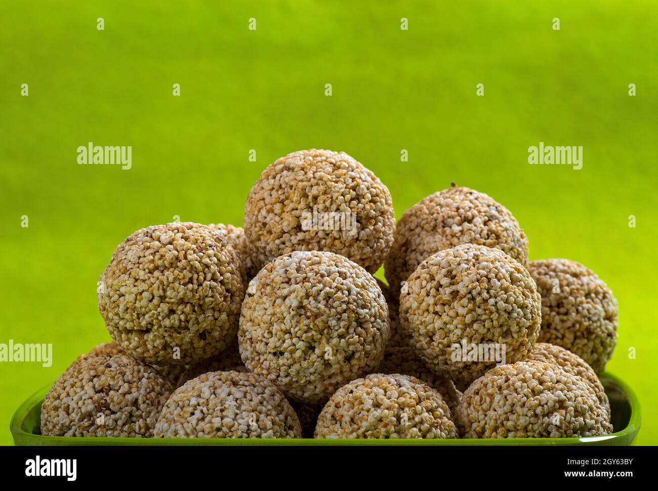 Amaranth or Rajgira laddu, Cholai ke laddo in green plate on green ...