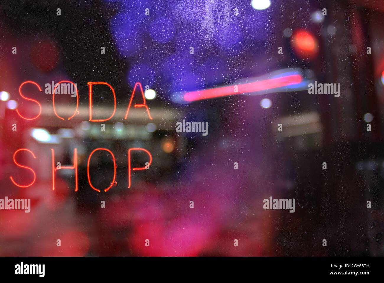 Vintage Neon Soda Shop Sign in Rainy Window Stock Photo - Alamy