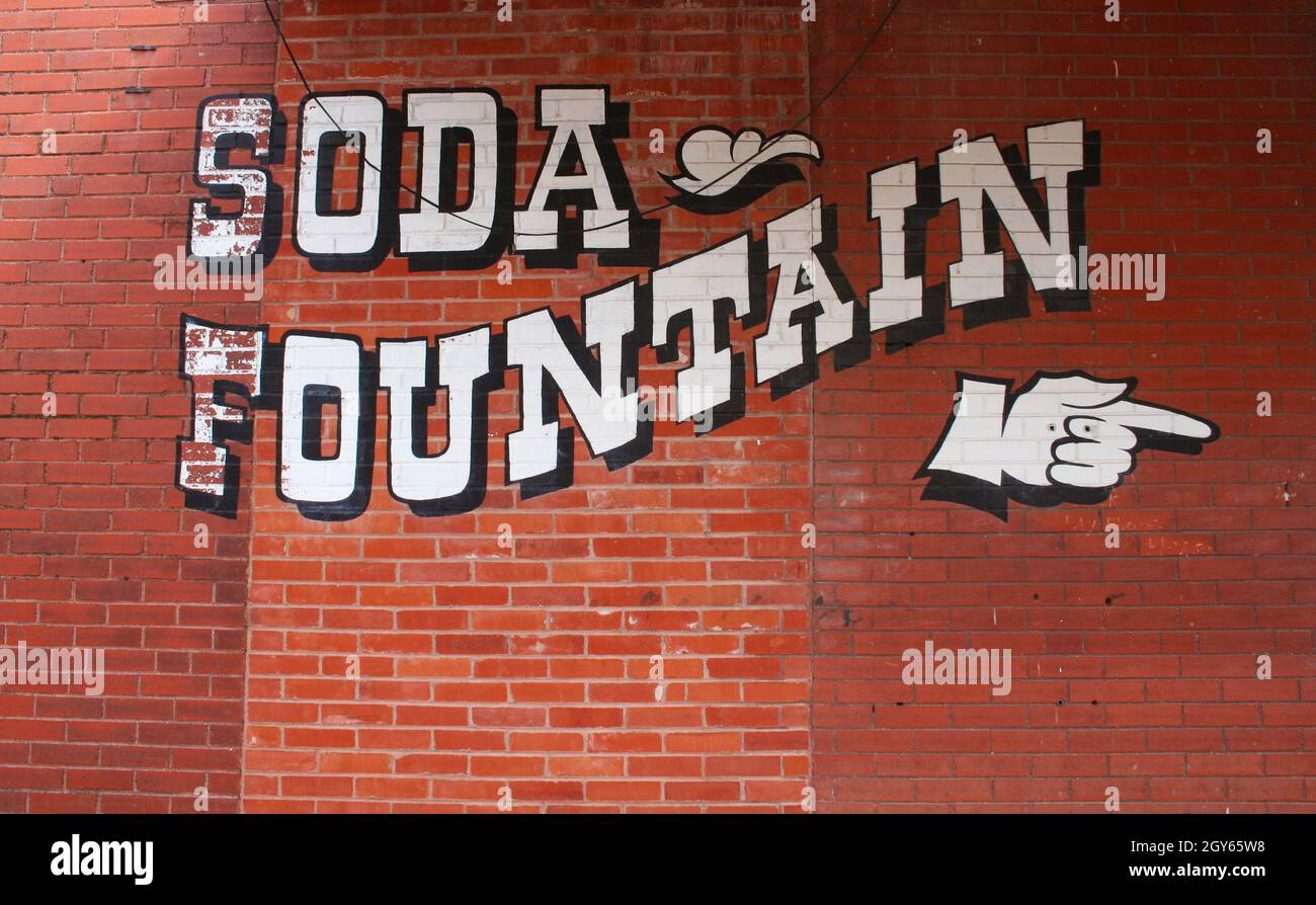 Soda Fountain Sign on Brick Wall Stock Photo - Alamy