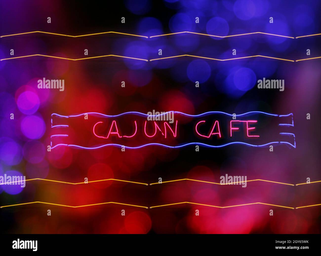 Vintage Neon Cajun Cafe Sign on Restaurant Wall Stock Photo - Alamy