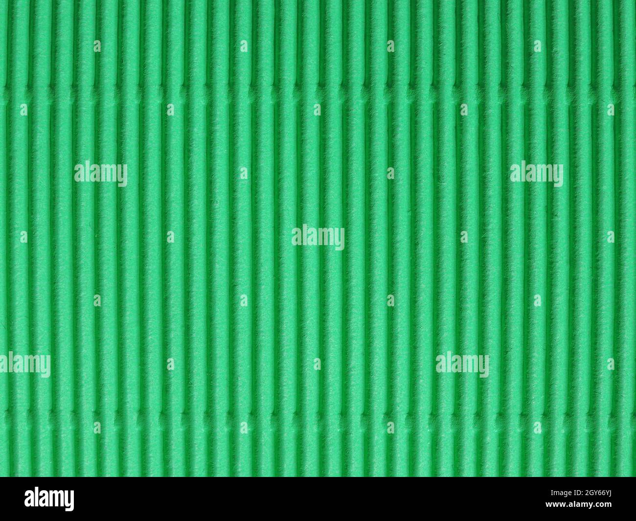 green cardboard texture useful as a background Stock Photo - Alamy