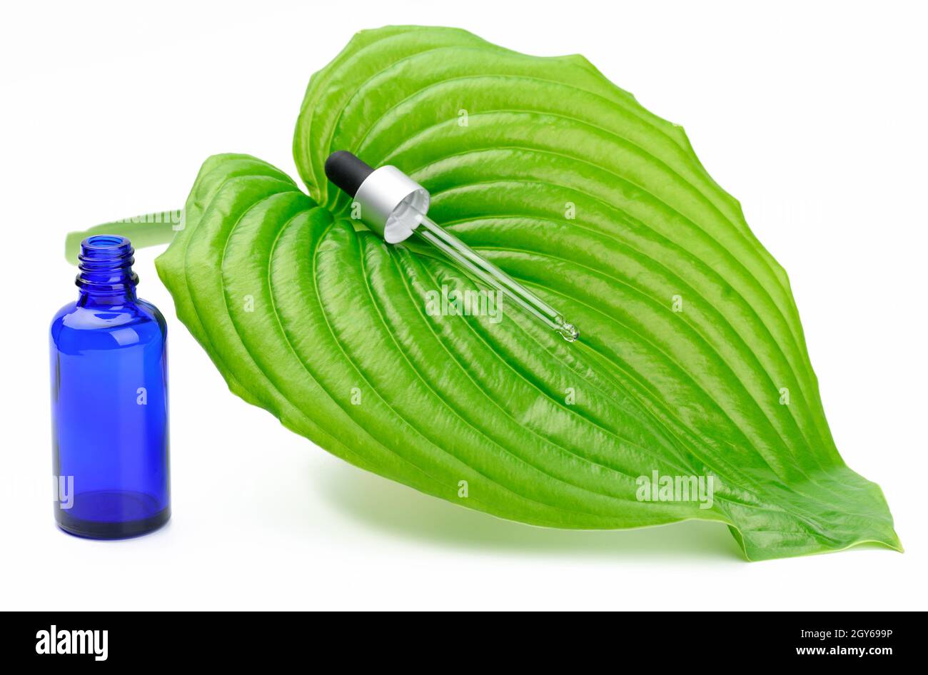 blue glass transparent bottle with a pipette on the background of a ...