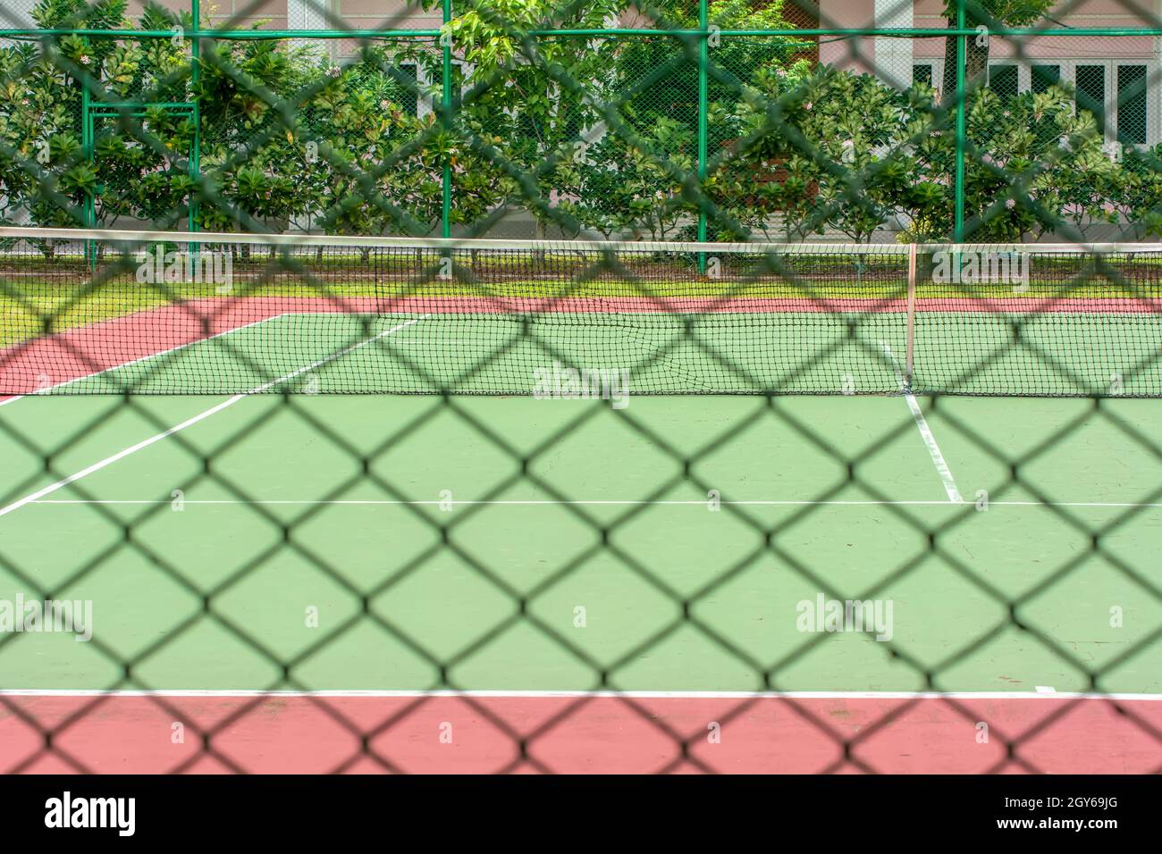 Tennis court in the area of the company. It is a good exercise Stock ...