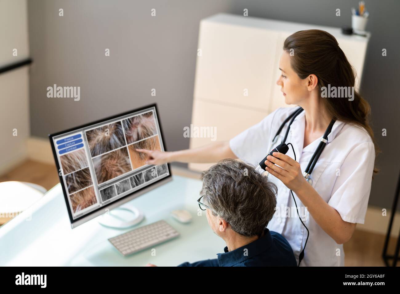 Hair Scalp Analysis In Clinic. Man With Hair Fall And Dandruff Stock ...
